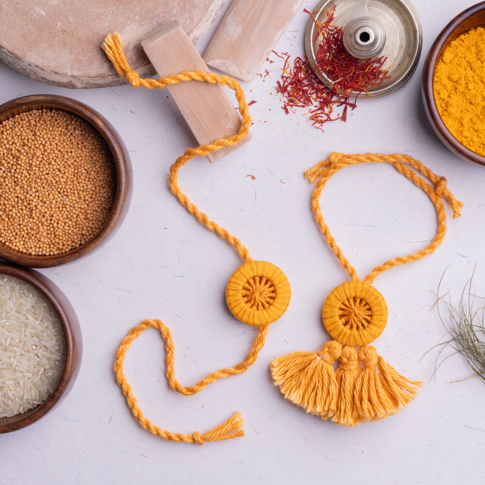 Vedic Rakhi Pairs – VRC083 | Chaarmology | Manufacturing And Delivering Handmade Floral Jewelry ...